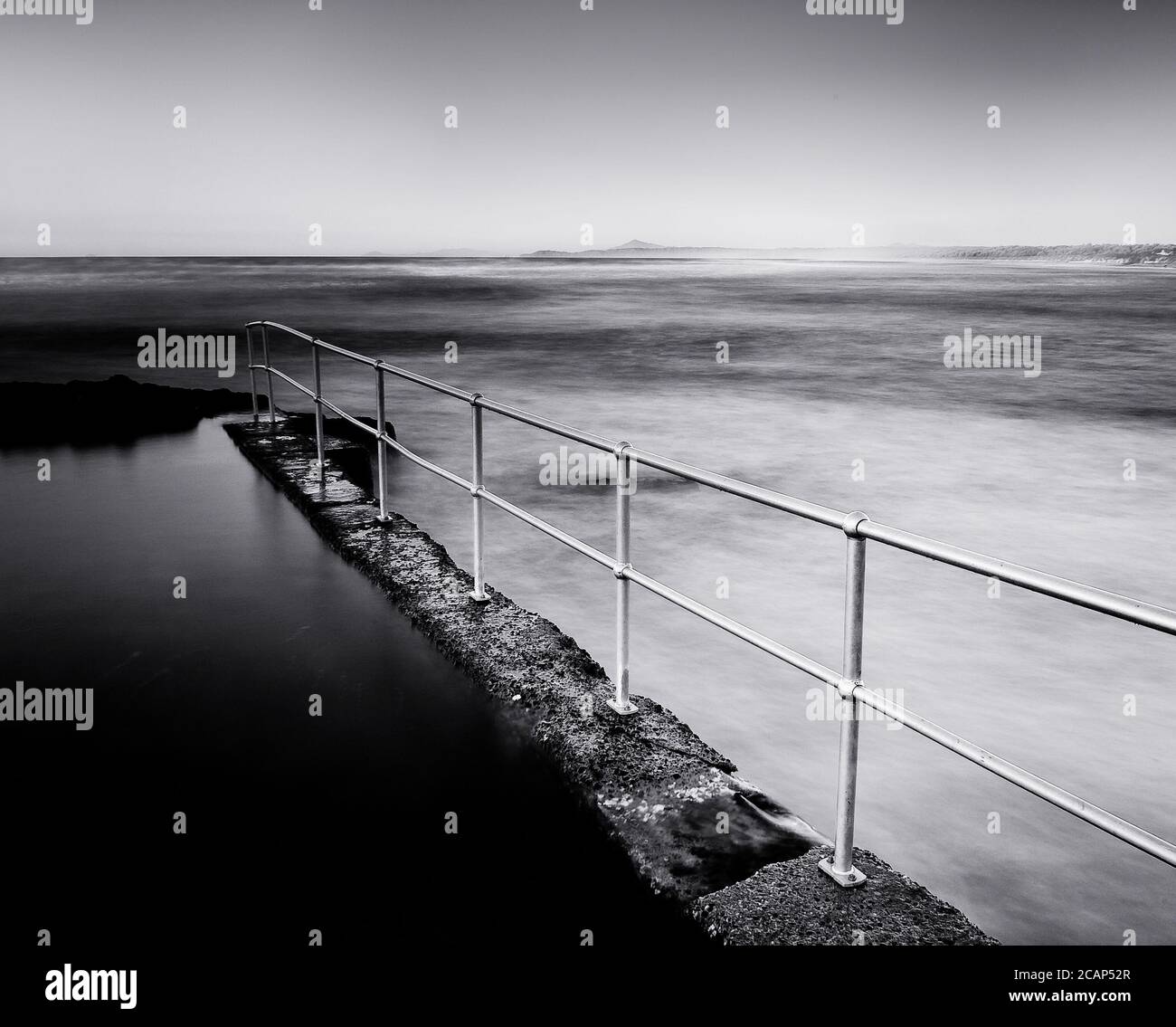 Sawtell Rock Pool long exposure in black and white Stock Photo - Alamy