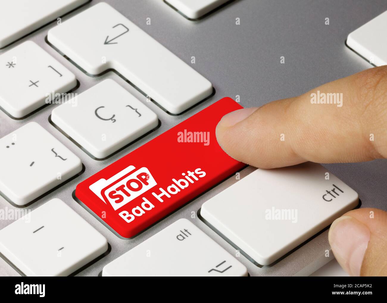 Stop Bad Habits Written on Red Key of Metallic Keyboard. Finger ...