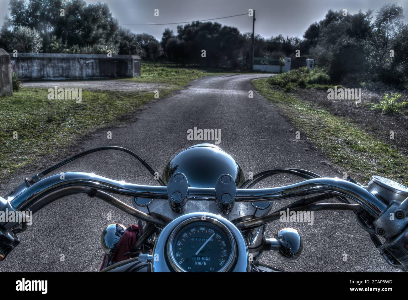 classic motorcycle on a country road in hdr tone mapping Stock Photo ...