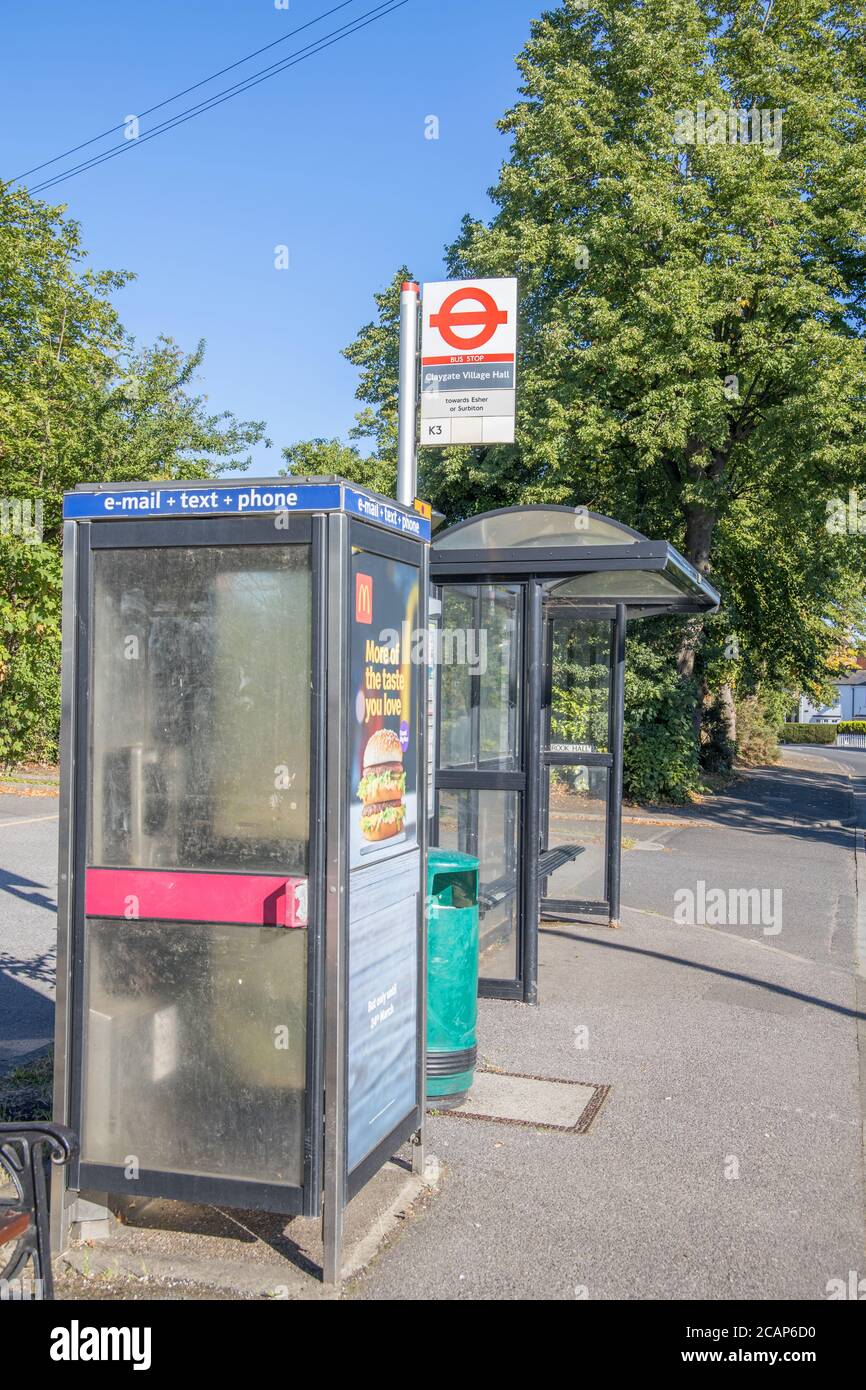 bus stop in claygate village surrey Stock Photo - Alamy
