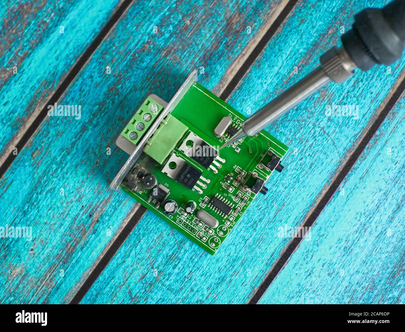 Damaged electronic board during repair with a soldering iron Stock ...