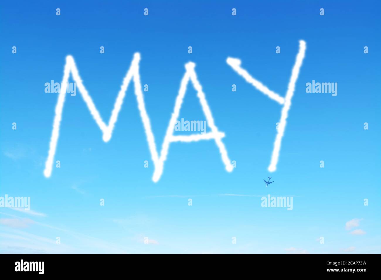 may written in the sky with contrails Stock Photo - Alamy