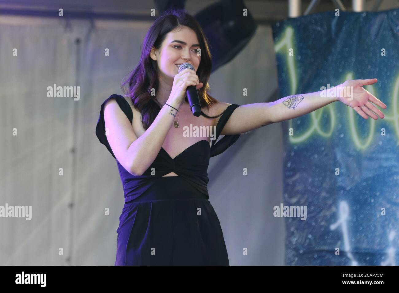 Singer Claire Howell, who appeared on The Voice performs at Light the ...