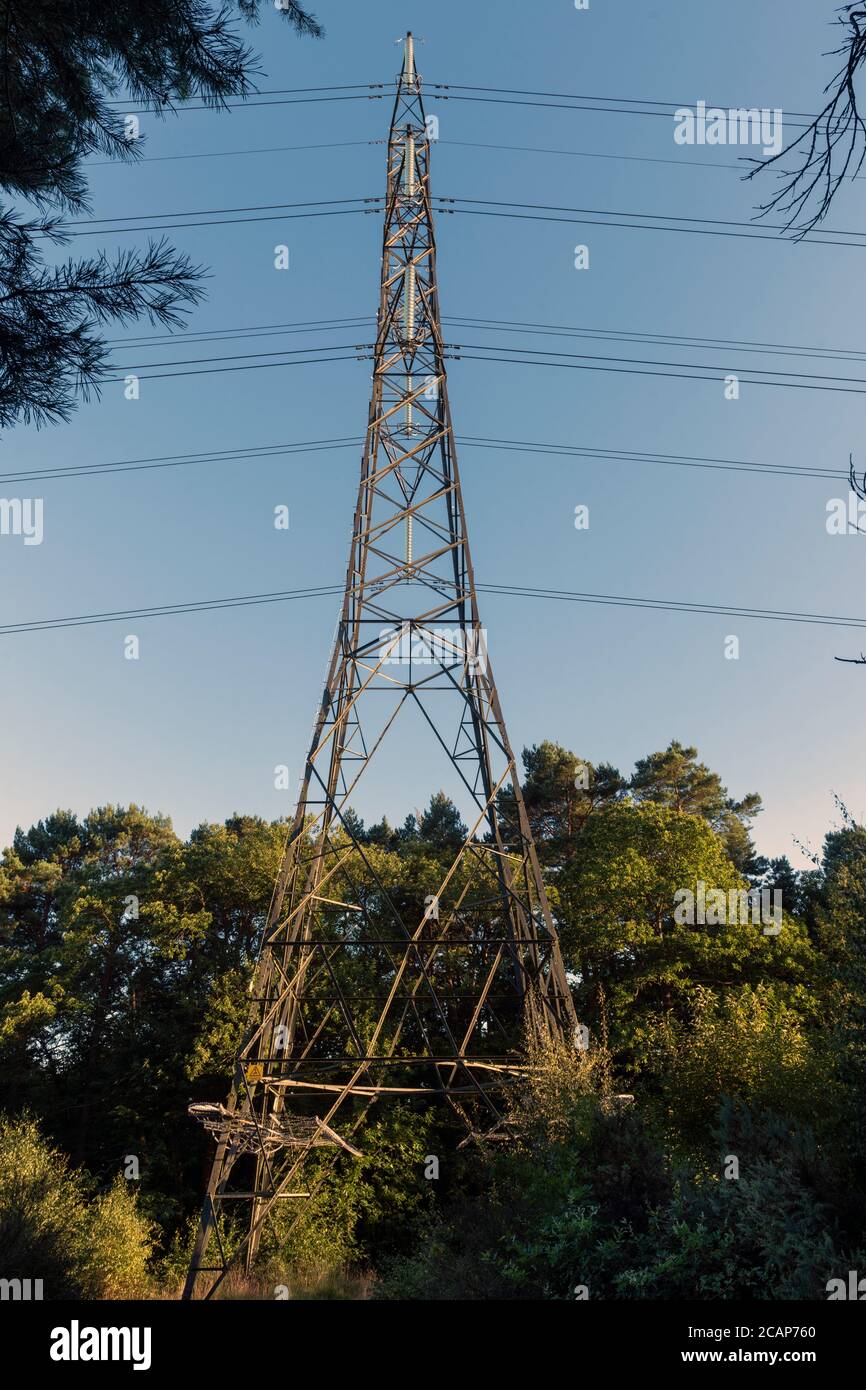 Eleccticity pylons in natural environment Stock Photo - Alamy