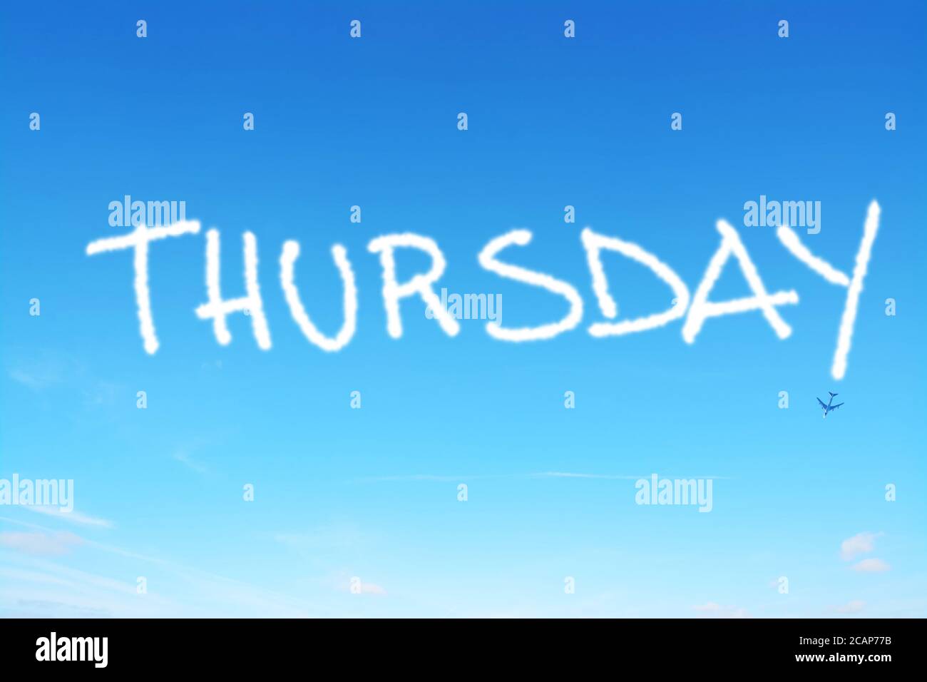 thursday written in the sky with contrails Stock Photo - Alamy