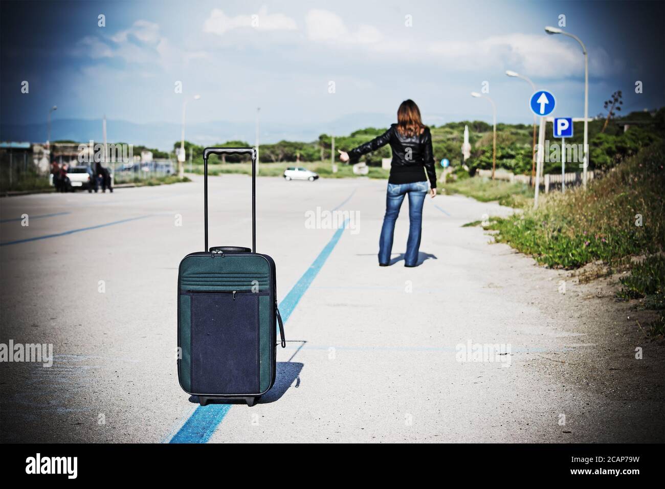 woman hitching a ride. Vintage effect Stock Photo - Alamy