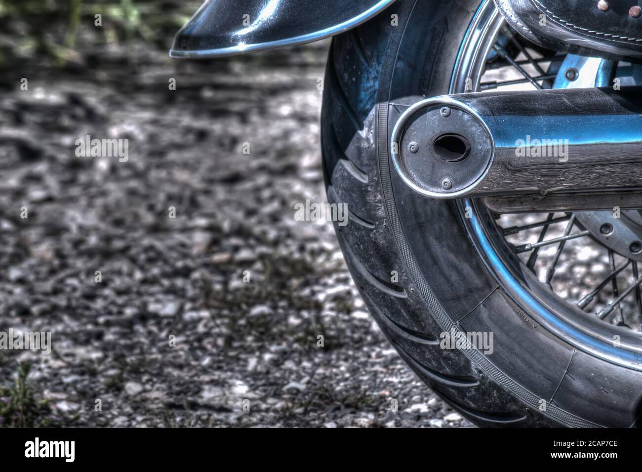 close up of a classic motorcycle rear wheel in hdr tone mapping effect ...