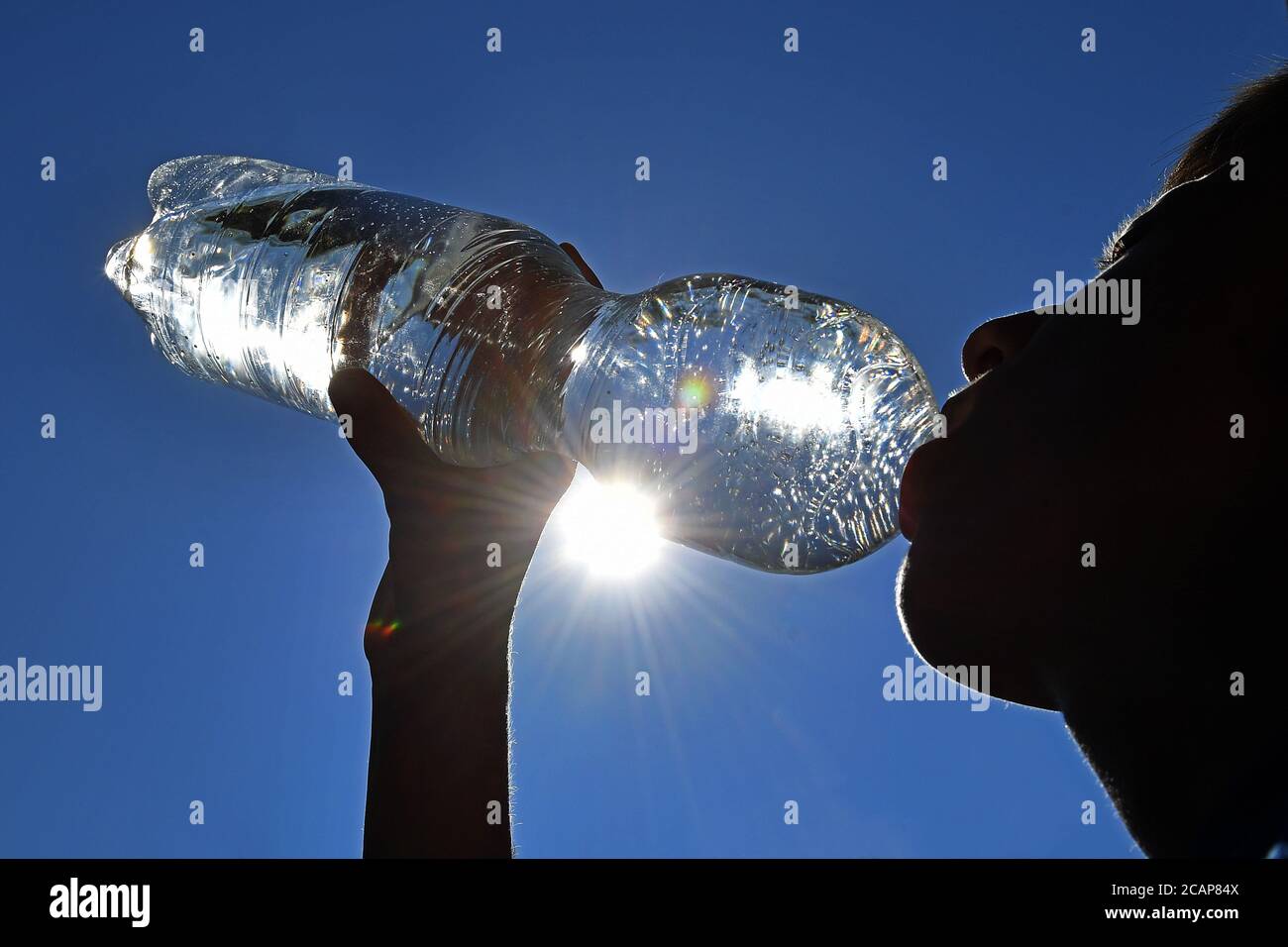 Child sweating drink water hi-res stock photography and images - Alamy