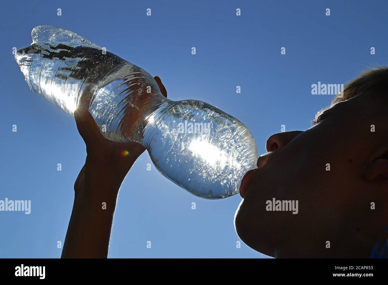 Child sweating drink water hi-res stock photography and images - Alamy
