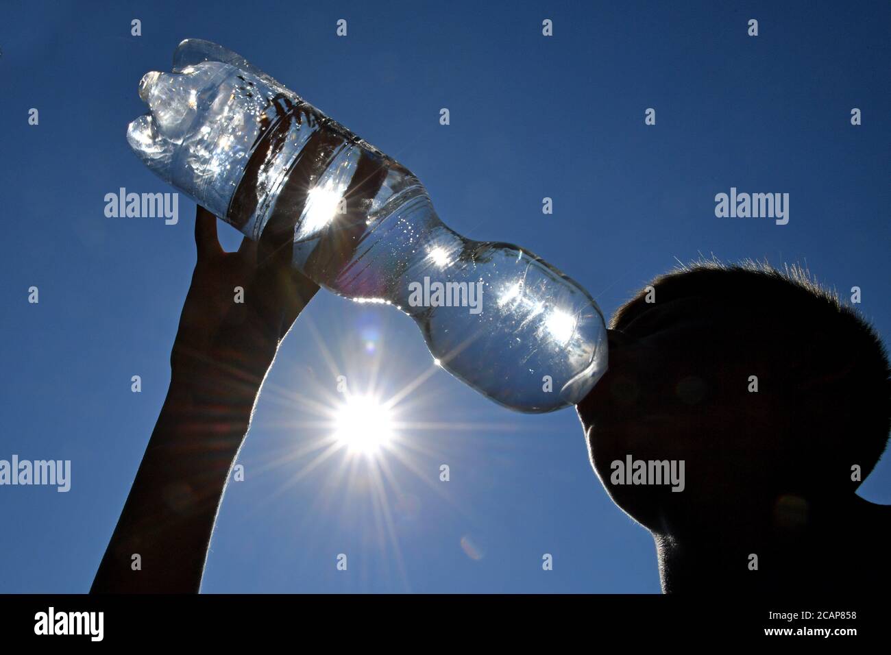 Child sweating drink water hi-res stock photography and images - Alamy