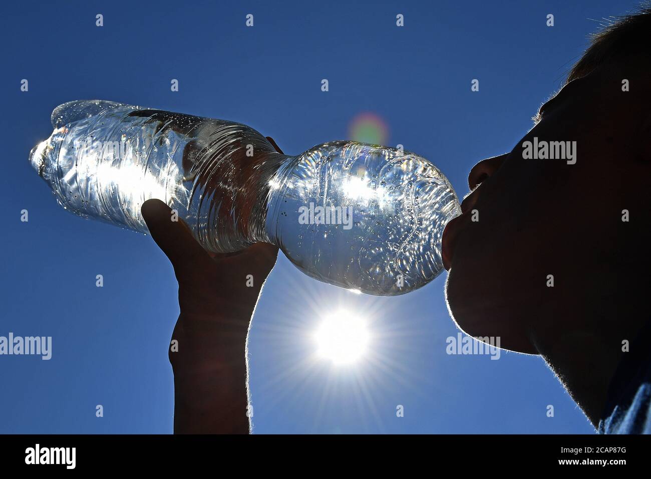 Child sweating drink water hi-res stock photography and images - Alamy