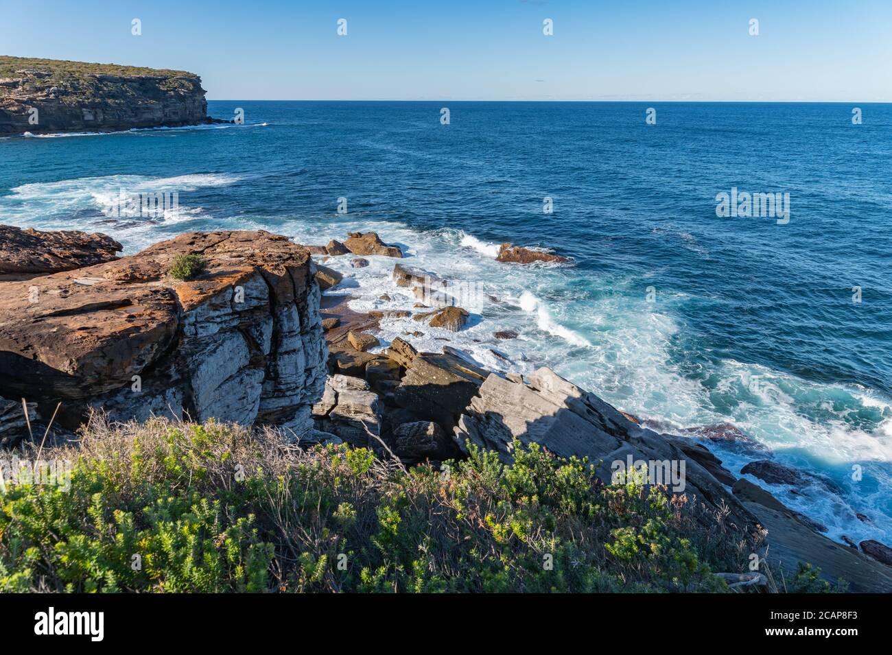 View of Open Ocean with dramatic sandstone landscape at Providential ...