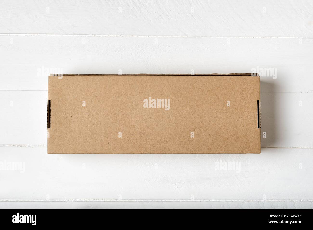 Rectangular carton box on white background. Design space Stock Photo ...