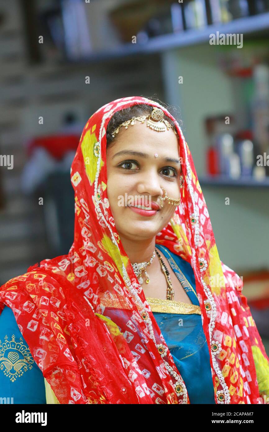 Indoors portrait of beautiful young woman laughing.Close up portrait of a house woman smiling ...