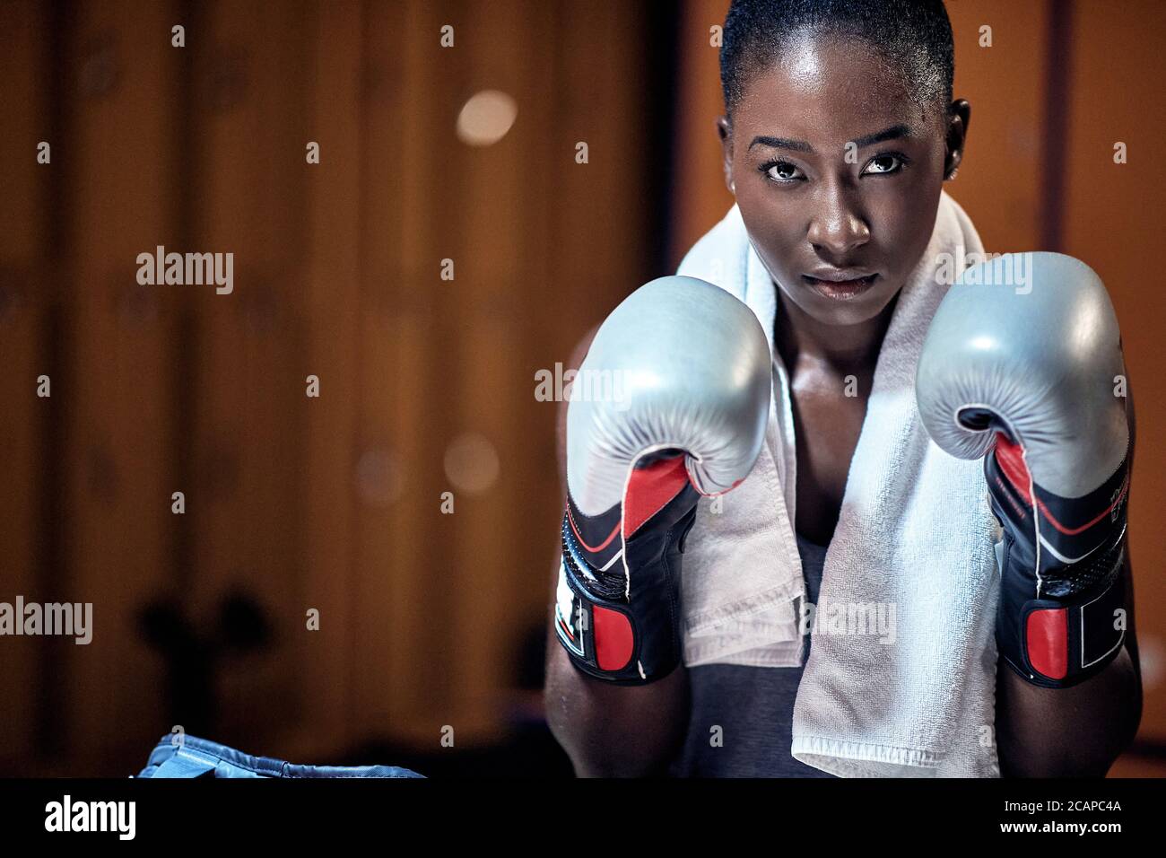 A young female boxer in a locker room ready for the match Stock Photo ...