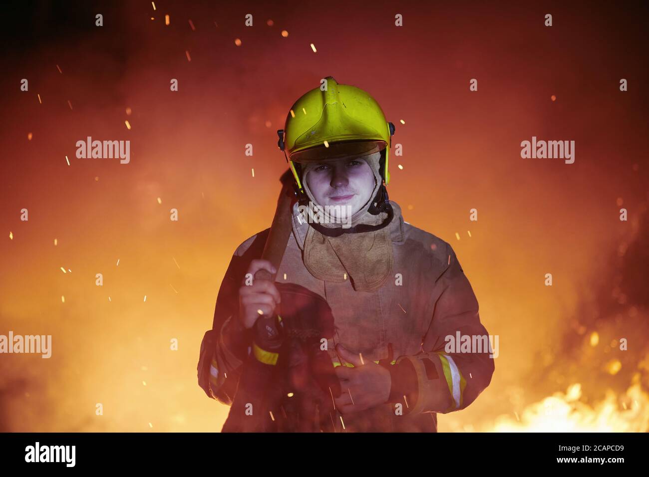 firefighter portrait on authentic fire location in forest Stock Photo ...