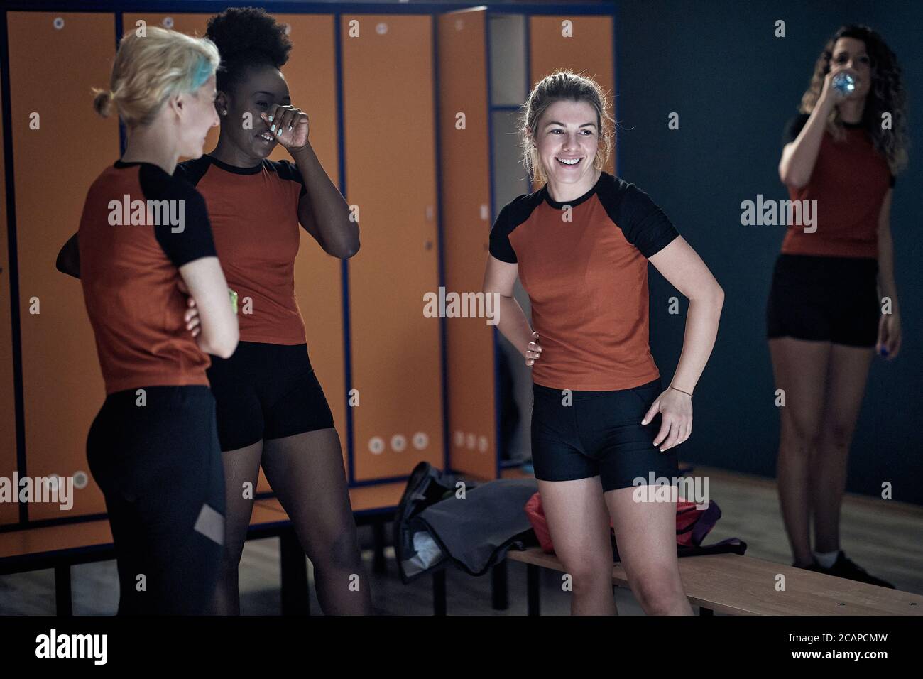 Female team in a locker room before a game Stock Photo - Alamy