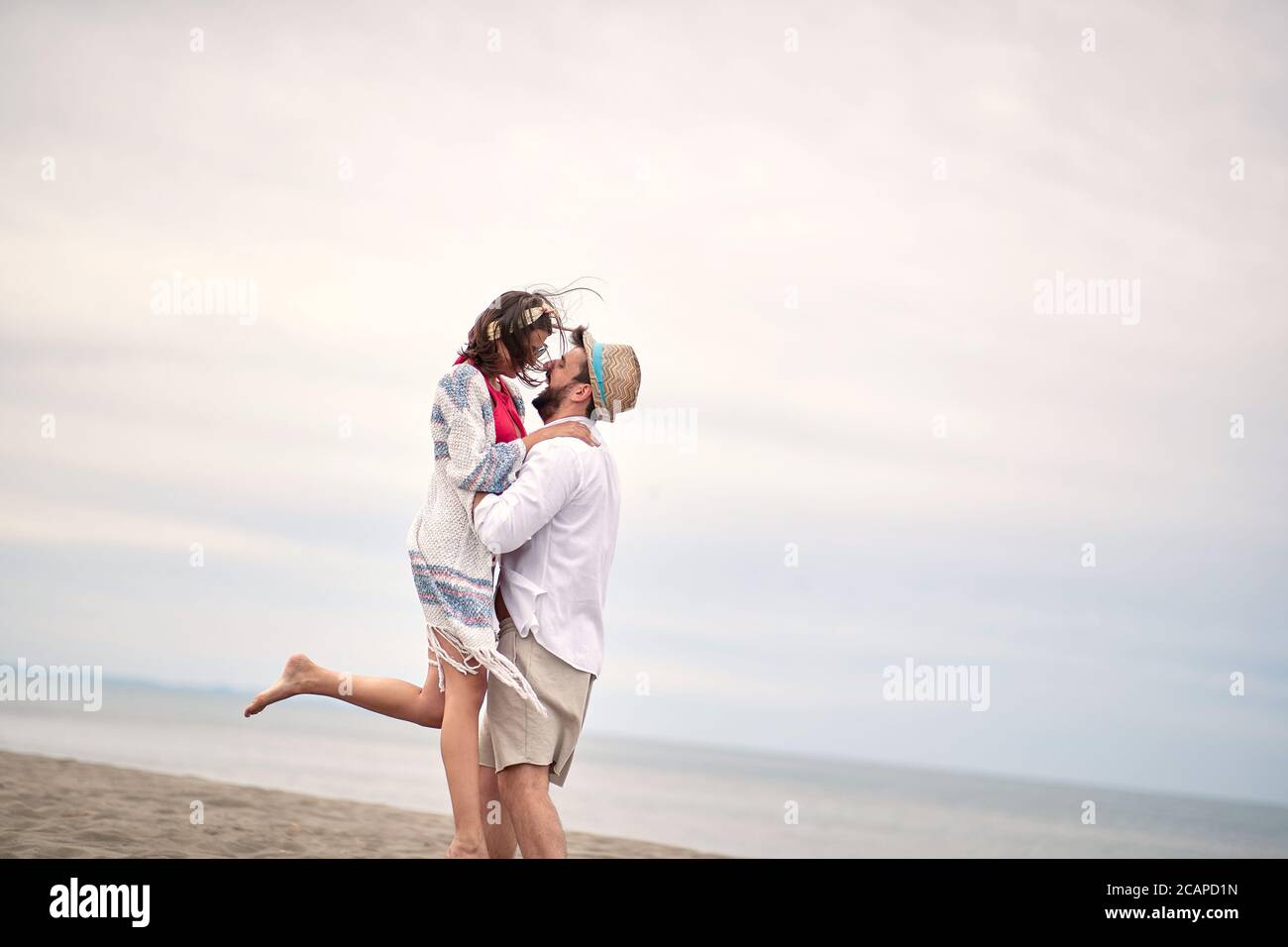 Boyfriend lifting girlfriend hi-res stock photography and images - Alamy