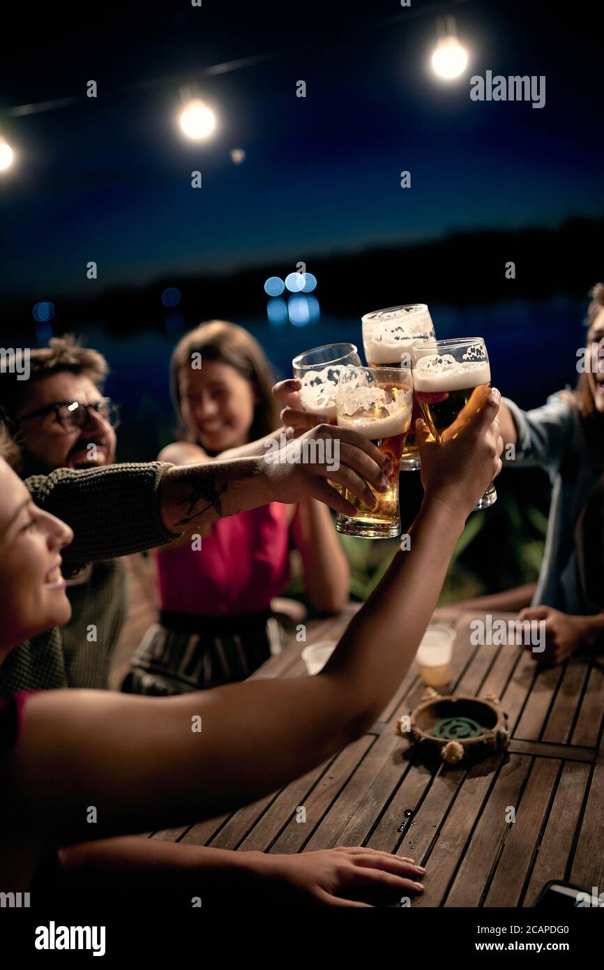 Group table drinks toast hi-res stock photography and images - Alamy
