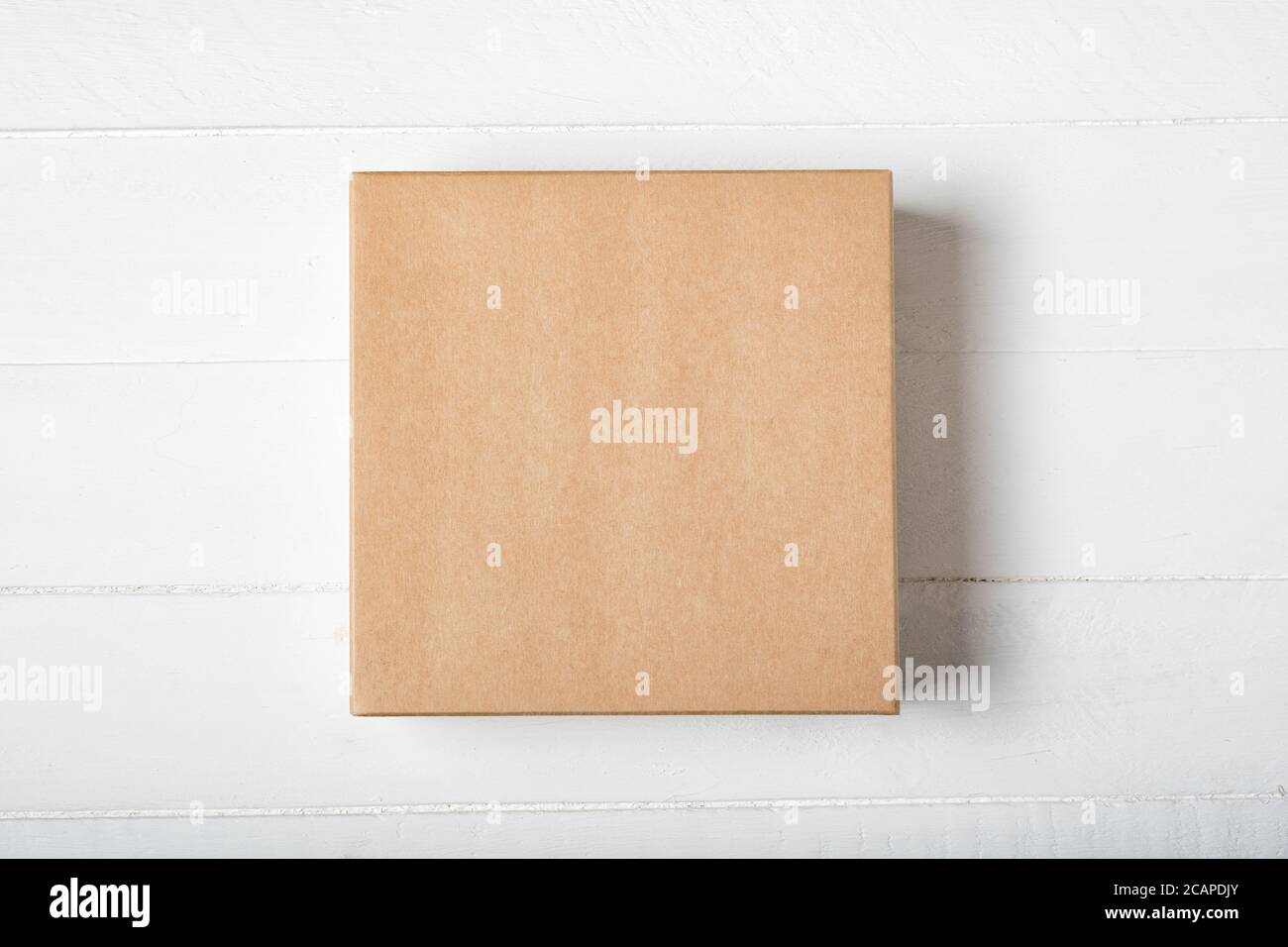 Square carton box on white background. Design space Stock Photo - Alamy