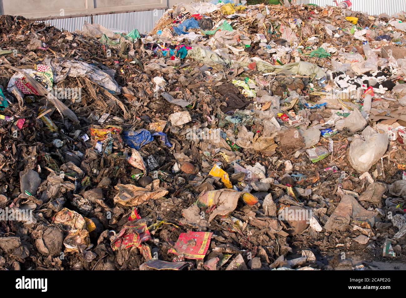 Dump with plastic bags, garbage and waste. Nature contamination and ...