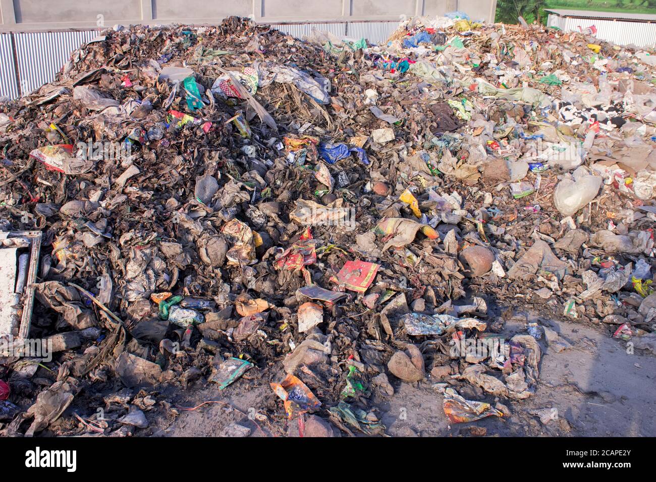 Dump with plastic bags, garbage and waste. Nature contamination and ...