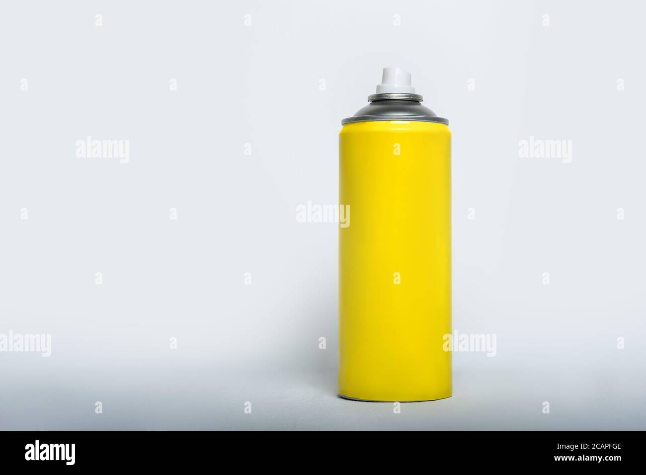 Yellow spray can for spray on a white background. No inscriptions Stock ...