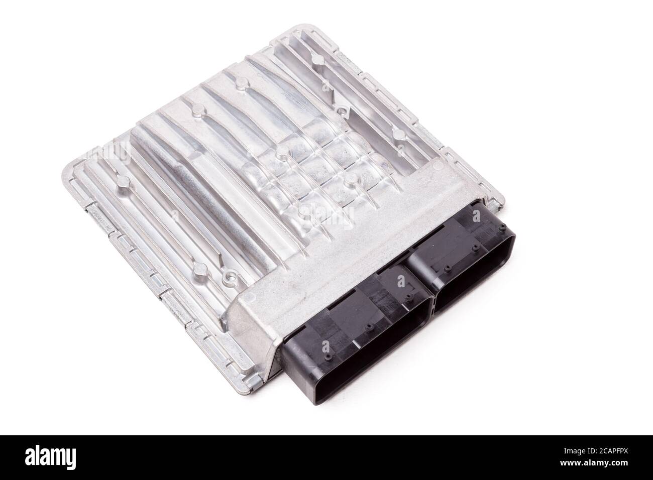 Aluminum car engine control unit with metal elements on white ...