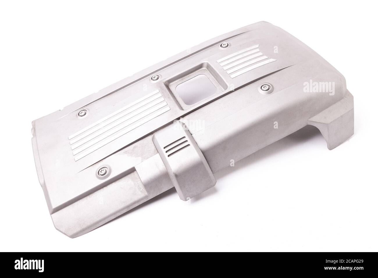 Gray engine cover on a white background in a photo studio as a separate ...