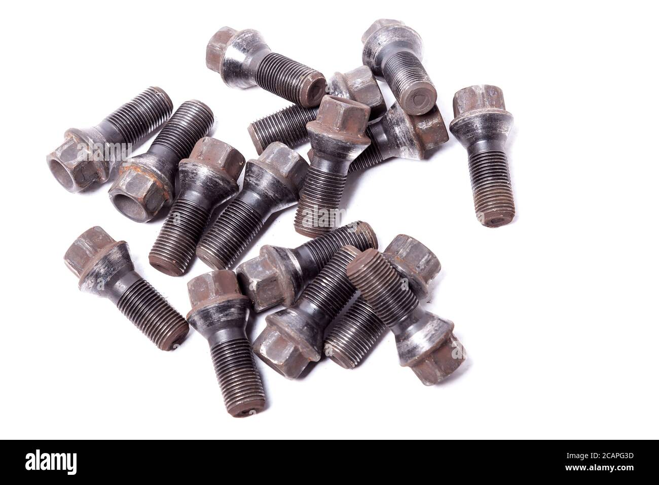 A handful of metal bolts with secret protection to fix the wheels and ...