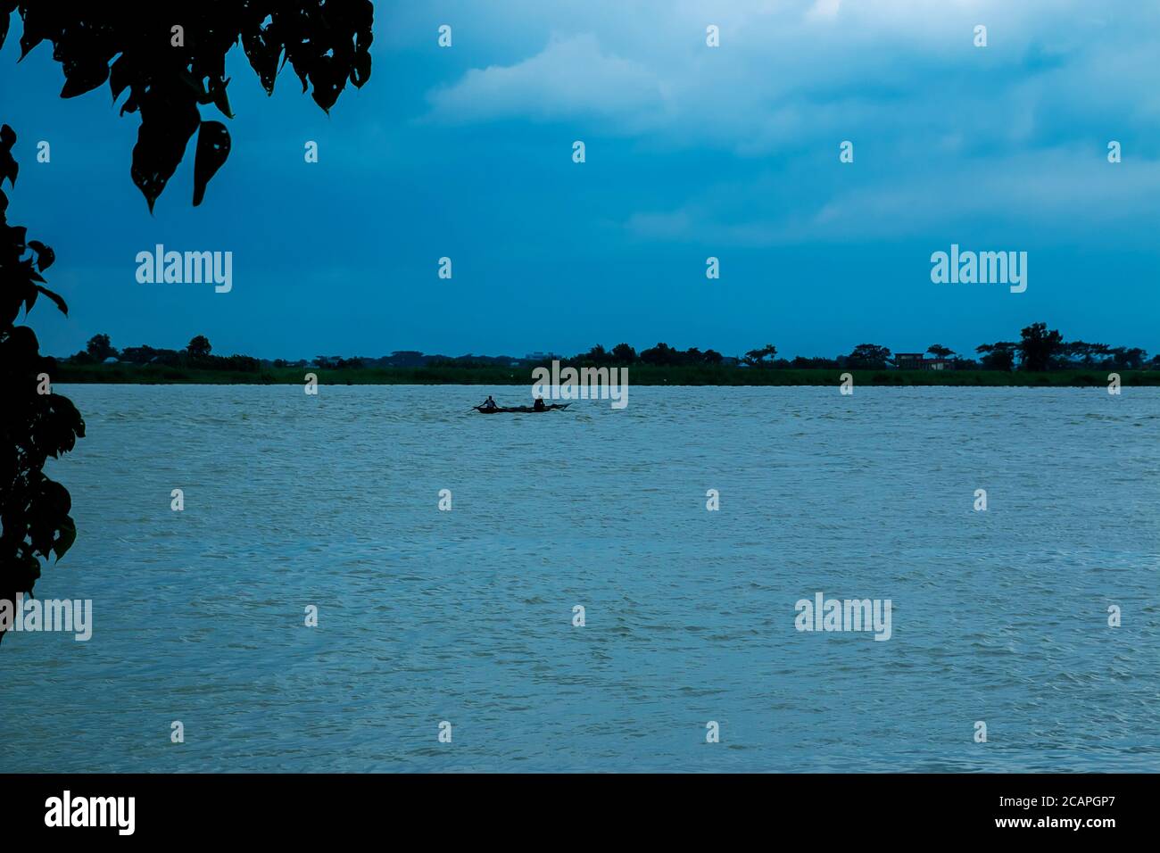 Blue sky background with beautiful river Stock Photo - Alamy