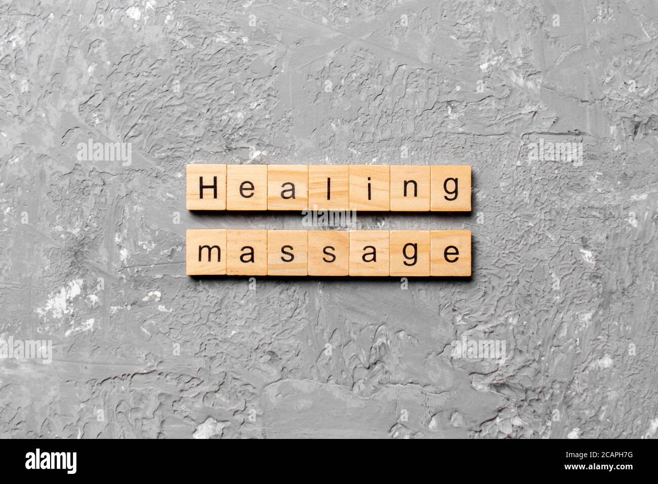 healing massage word written on wood block. healing massage text on ...