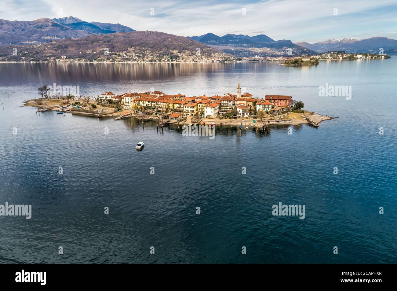 Aerial view of Fishermens Island or Isola dei Pescatori at Lake ...