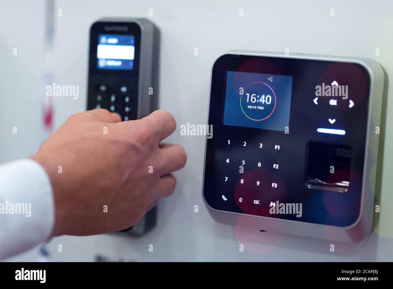 Fingerprint scan provides security access with biometrics identification. Business Technology ...