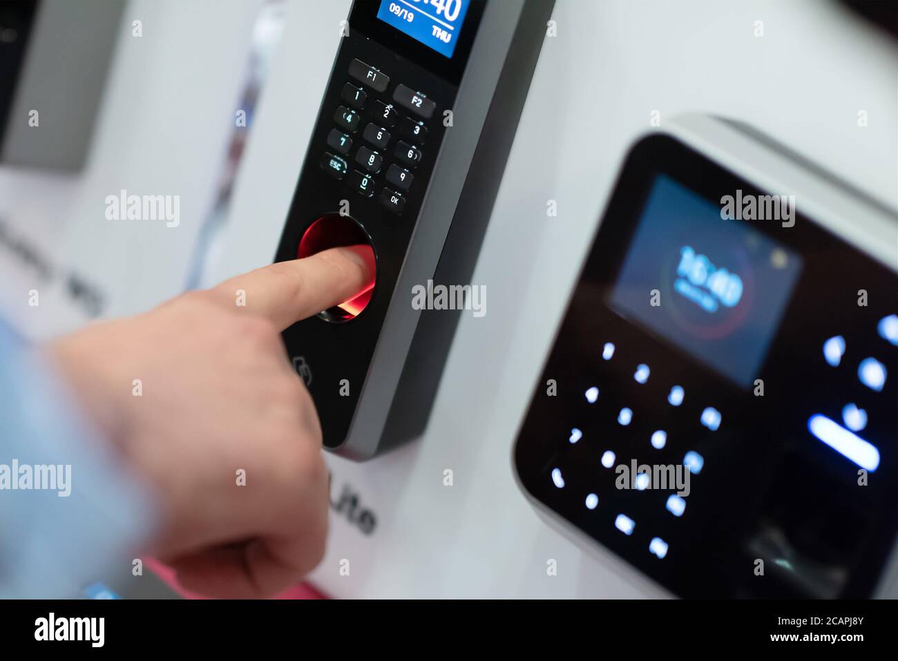 Fingerprint scan provides security access with biometrics identification. Business Technology ...