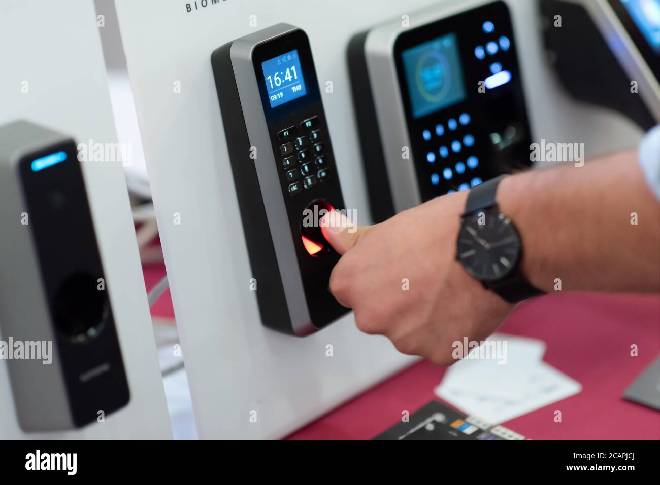 Fingerprint scan provides security access with biometrics identification. Business Technology ...