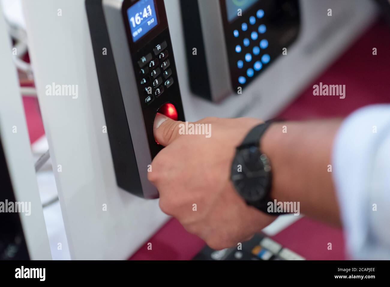 Fingerprint scan provides security access with biometrics identification. Business Technology ...