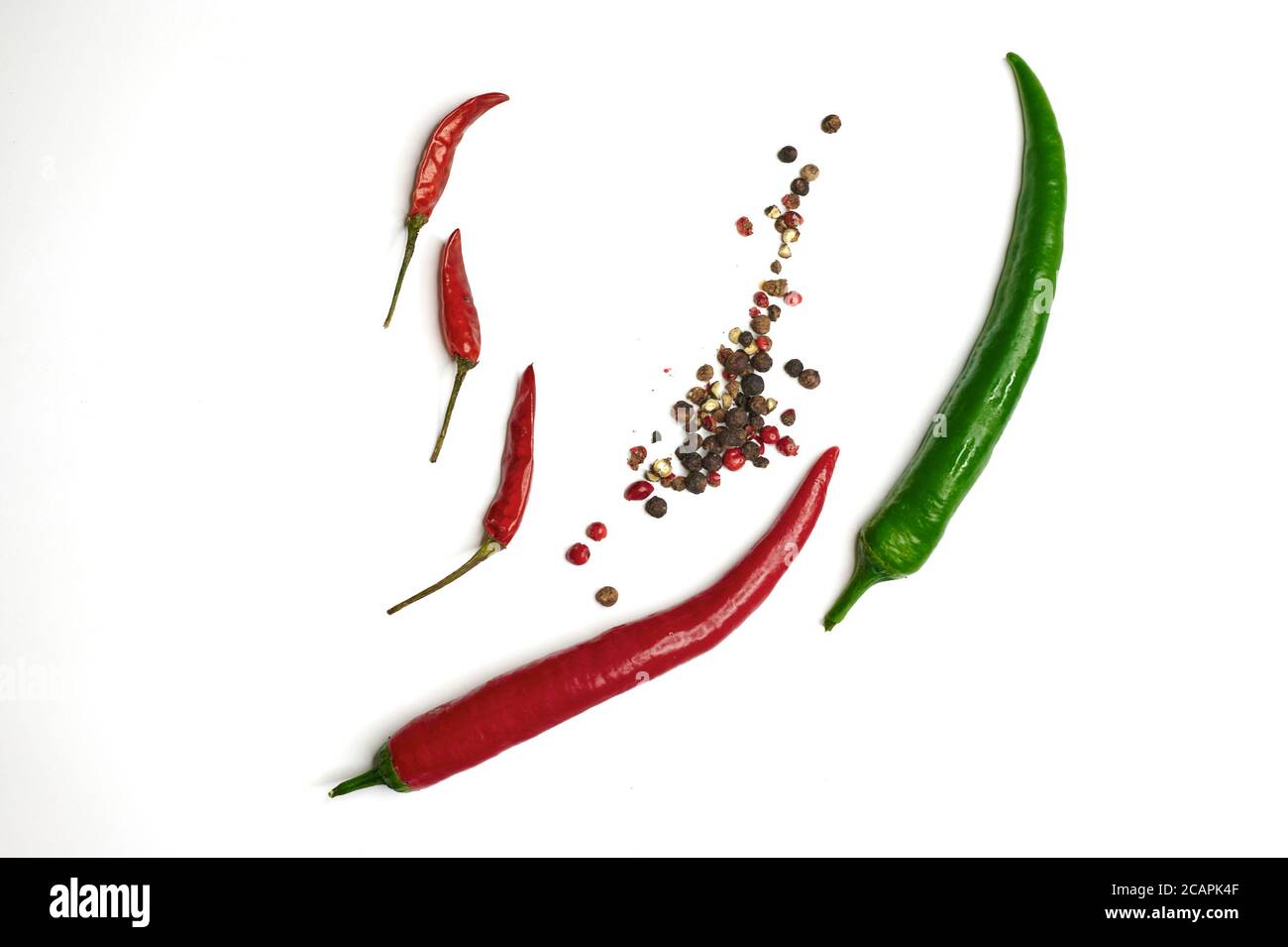 4 types of close-up peppers from above on a light background Stock ...