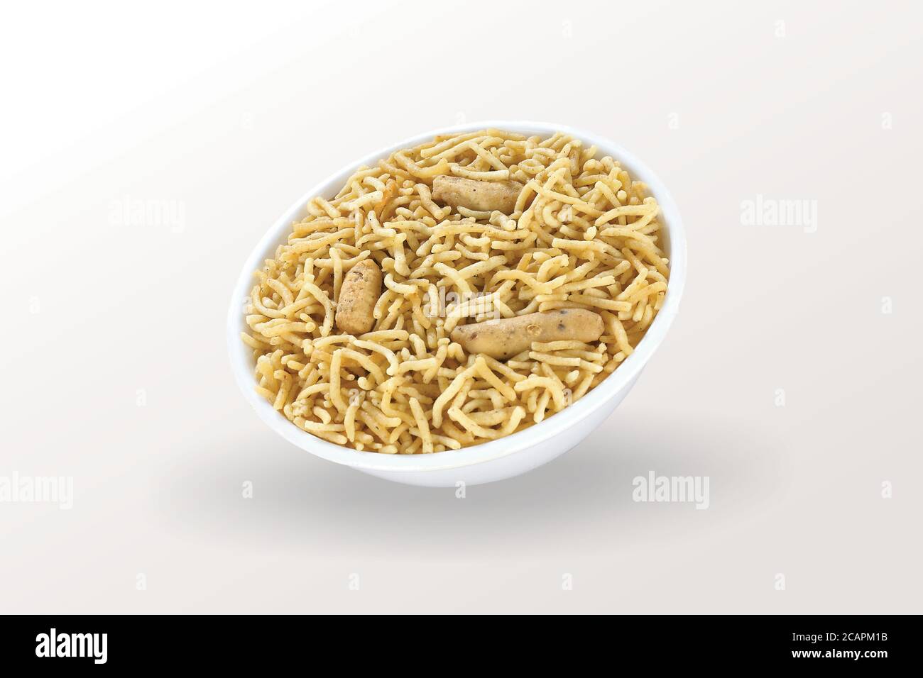 Indian Mathari made with fine wheat flour and namkeen Bikaneri Bhujiya ...