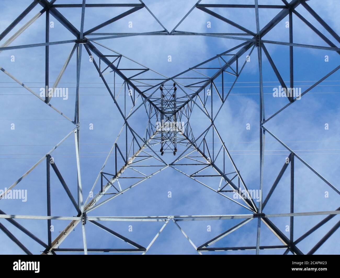 Power tower electric pylon symmetric pattern Stock Photo - Alamy