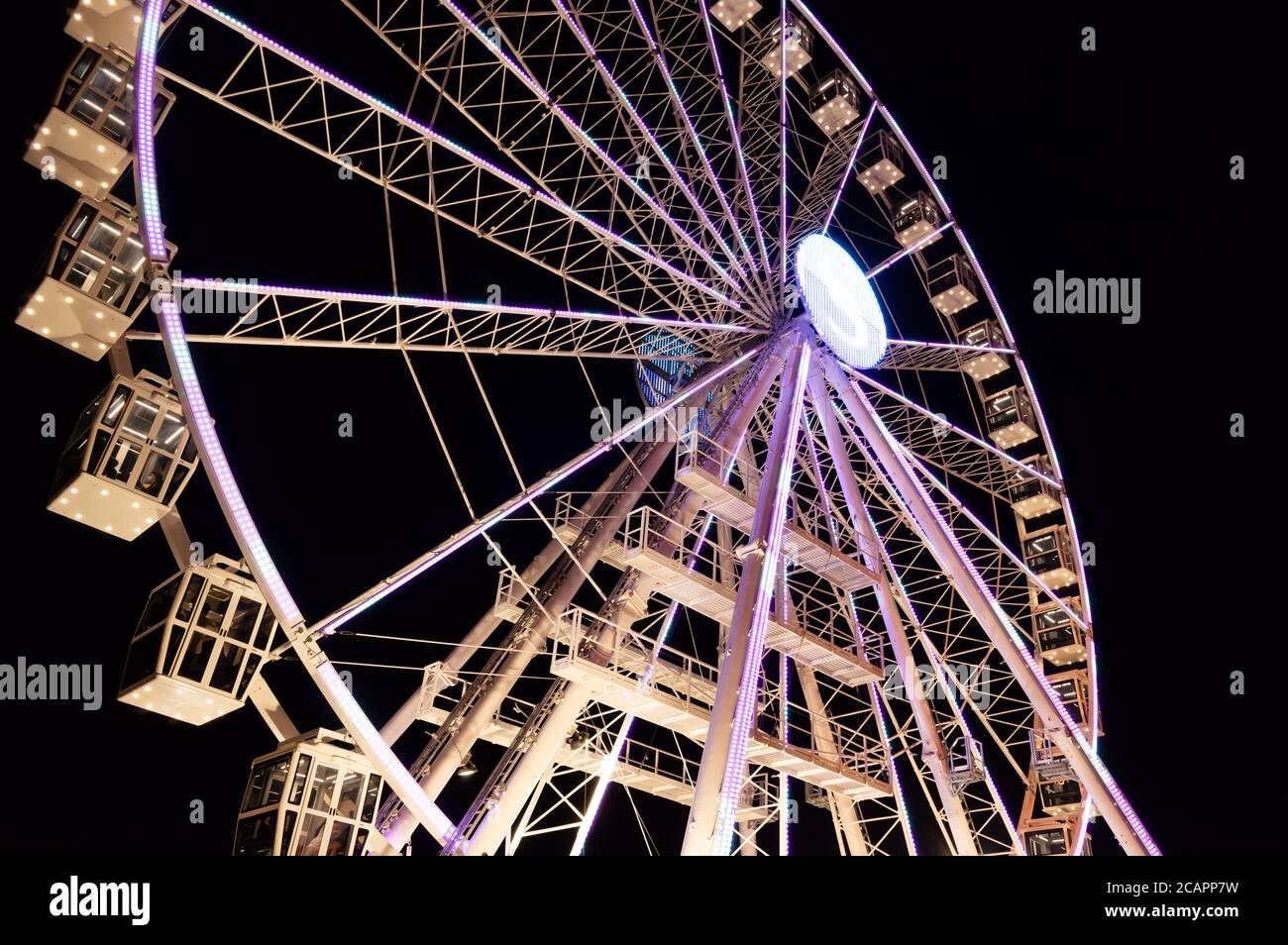 ferris wheel at night perspective Stock Photo - Alamy