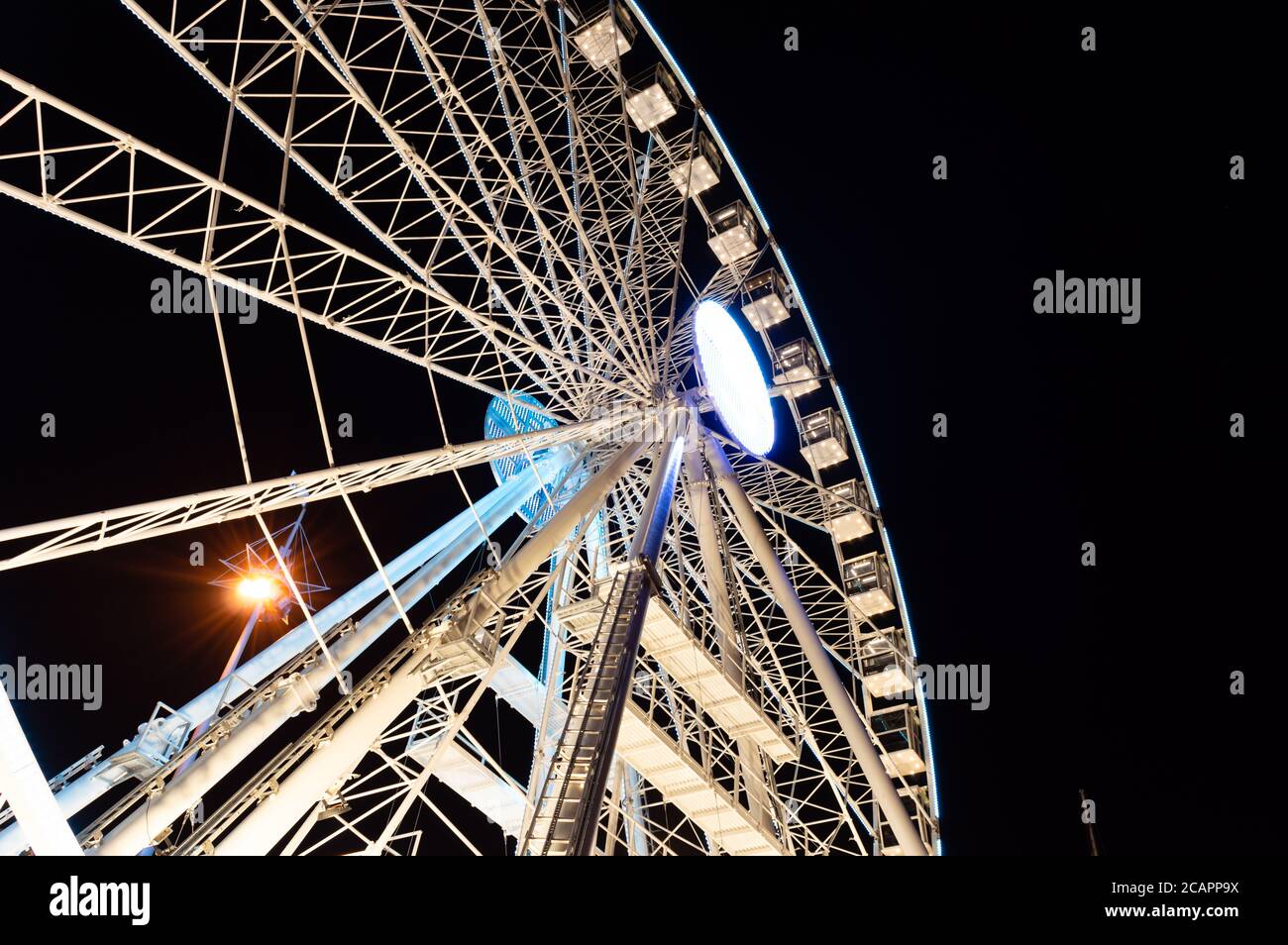 ferris wheel at night perspective Stock Photo - Alamy
