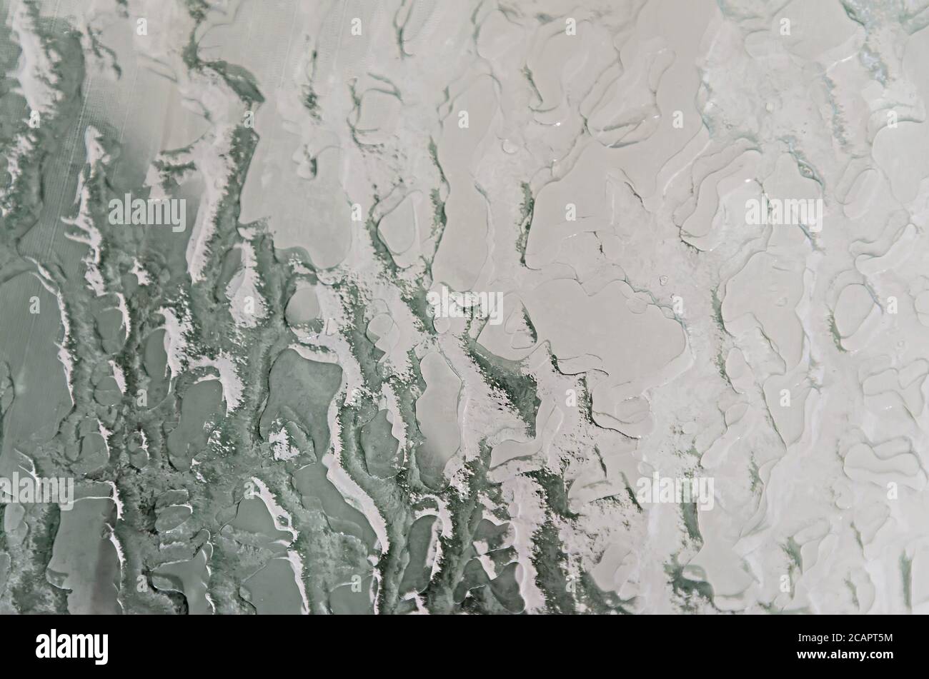 Freeze rain,window covered by deep ice Stock Photo - Alamy
