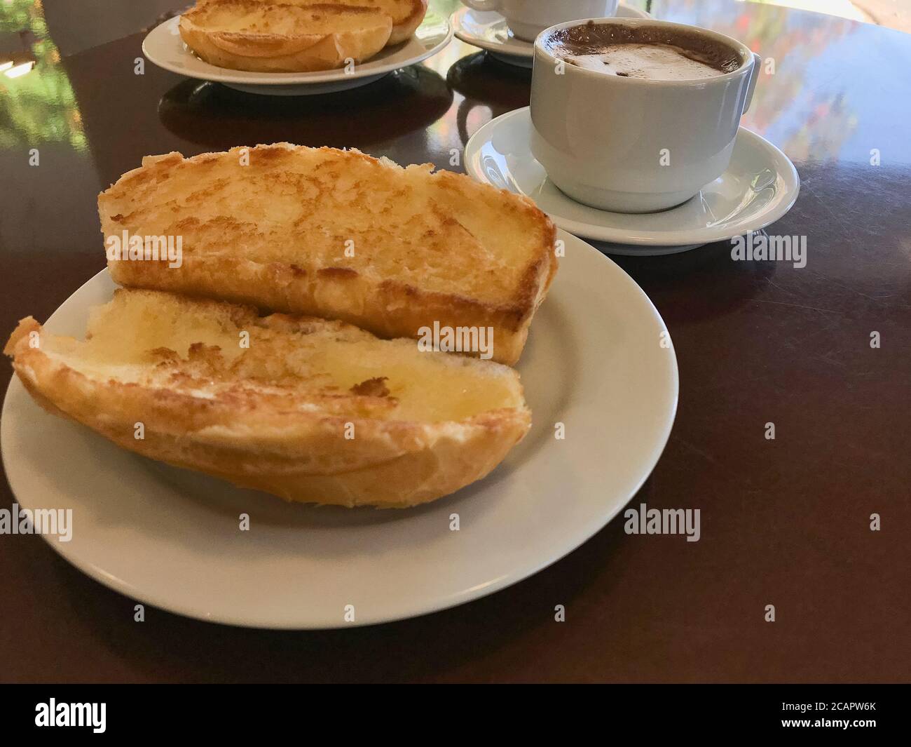 Breakfast at Brazil with french bread toasted Stock Photo - Alamy