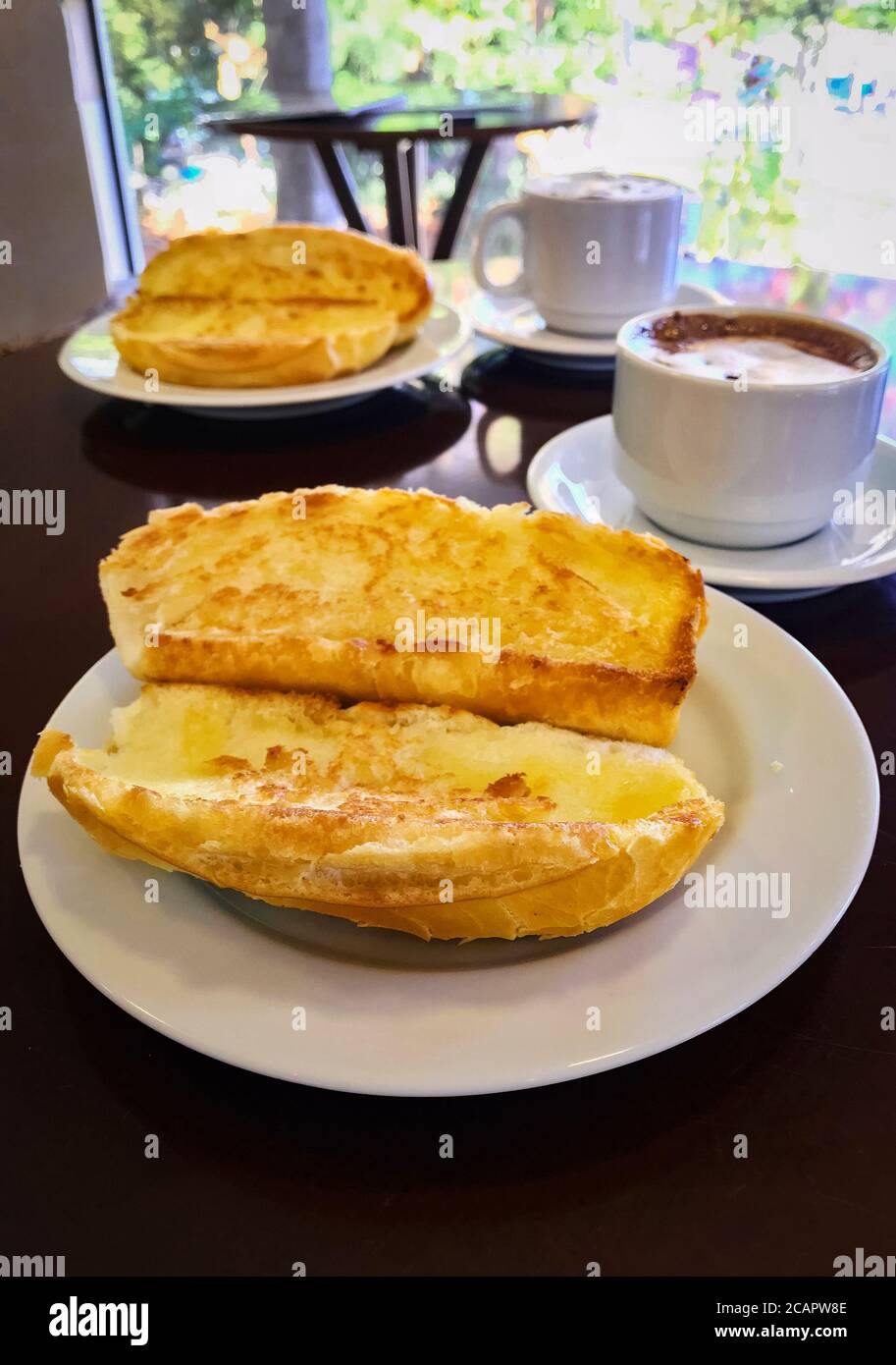 Breakfast at Brazil with french bread toasted Stock Photo - Alamy