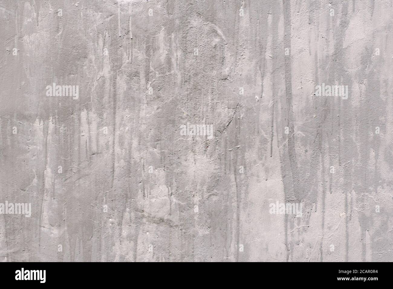 Gray rough plastered wall with smudges. Backgrounds and textures Stock ...