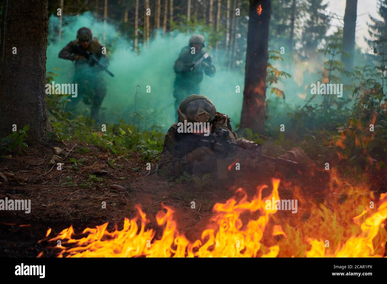 Modern warfare Soldiers Squad Running as Team in Battle Formation Stock ...