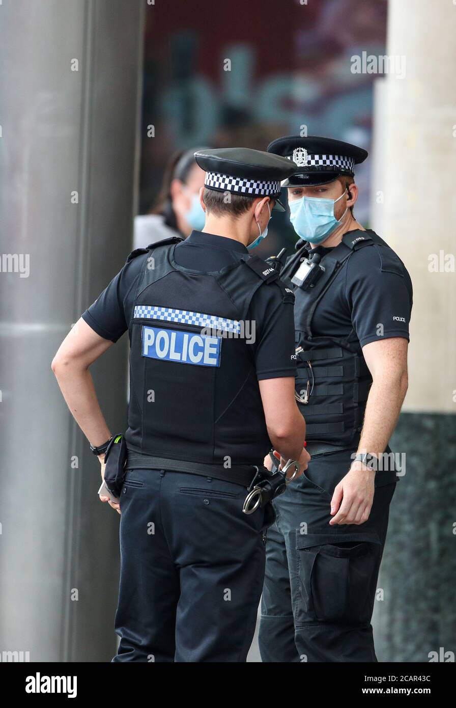 Police officer with mask hi-res stock photography and images - Alamy