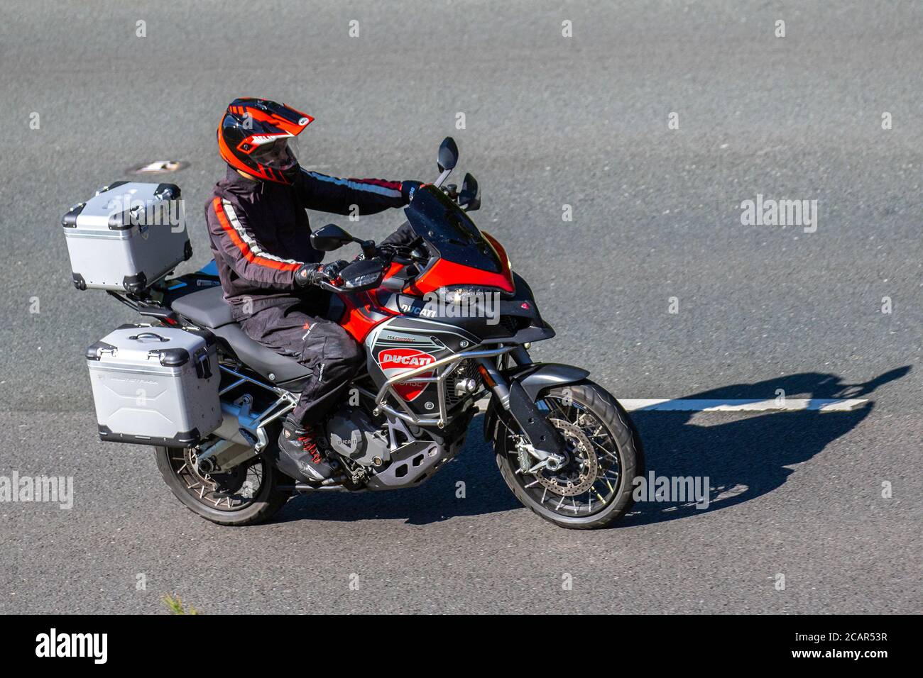 Ducati Motorbike rider; two wheeled transport, motorcycles, vehicle ...