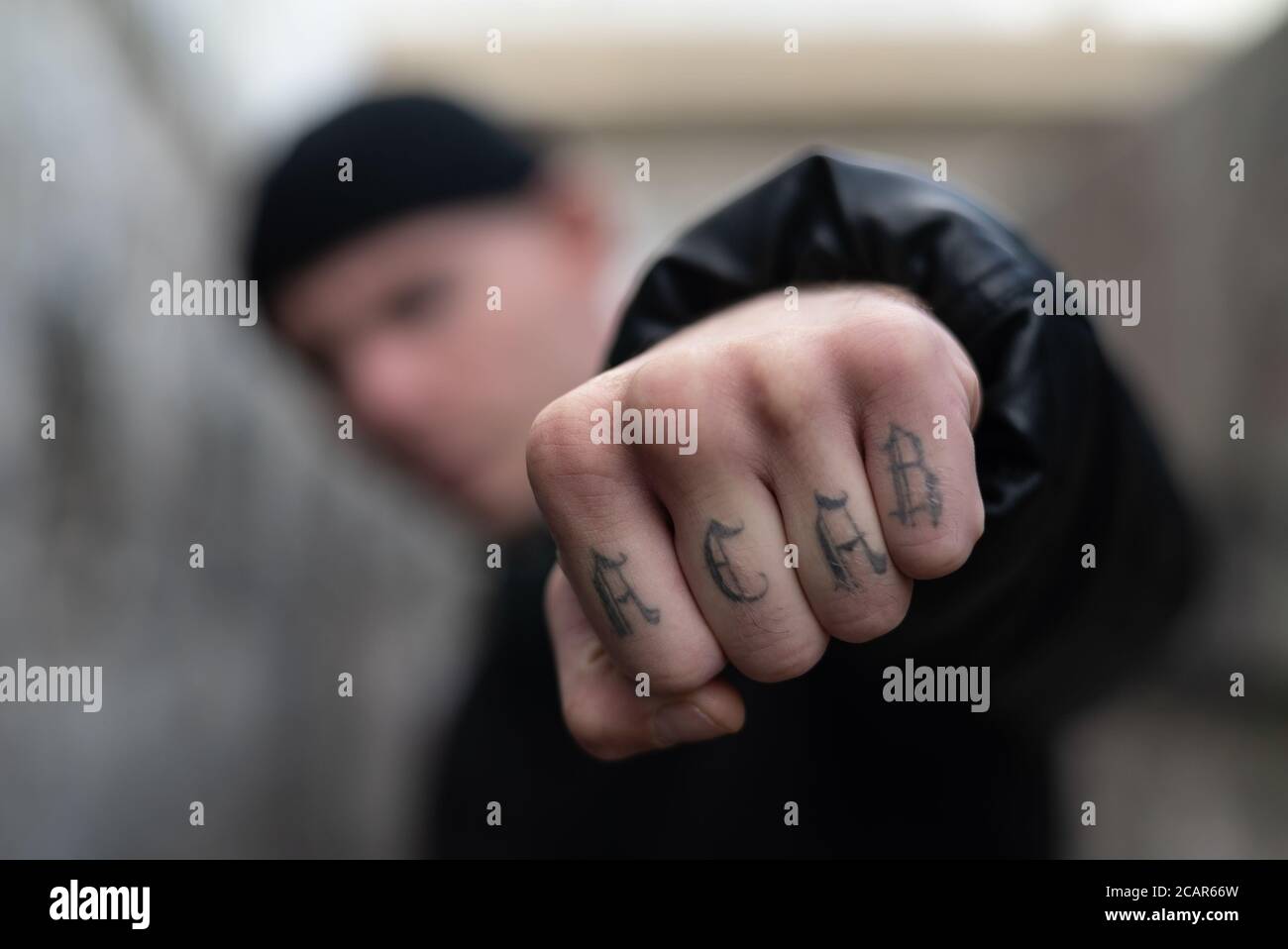 ACAB tattoo on the arm of a bully man Stock Photo - Alamy